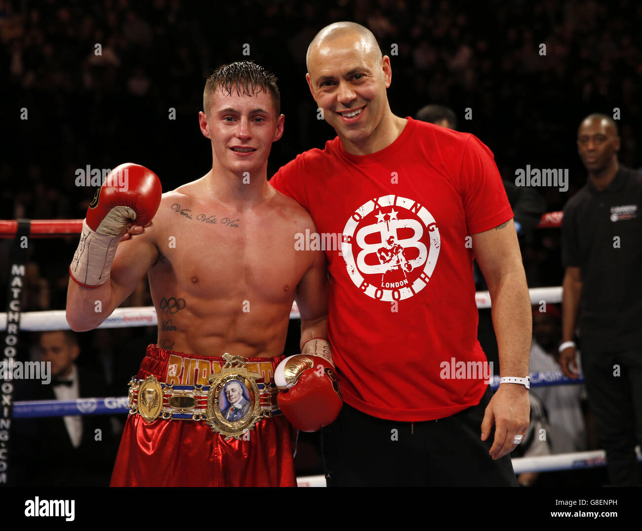 Ryan Burnett (left) celebrates his victory over Jason Booth with ...
