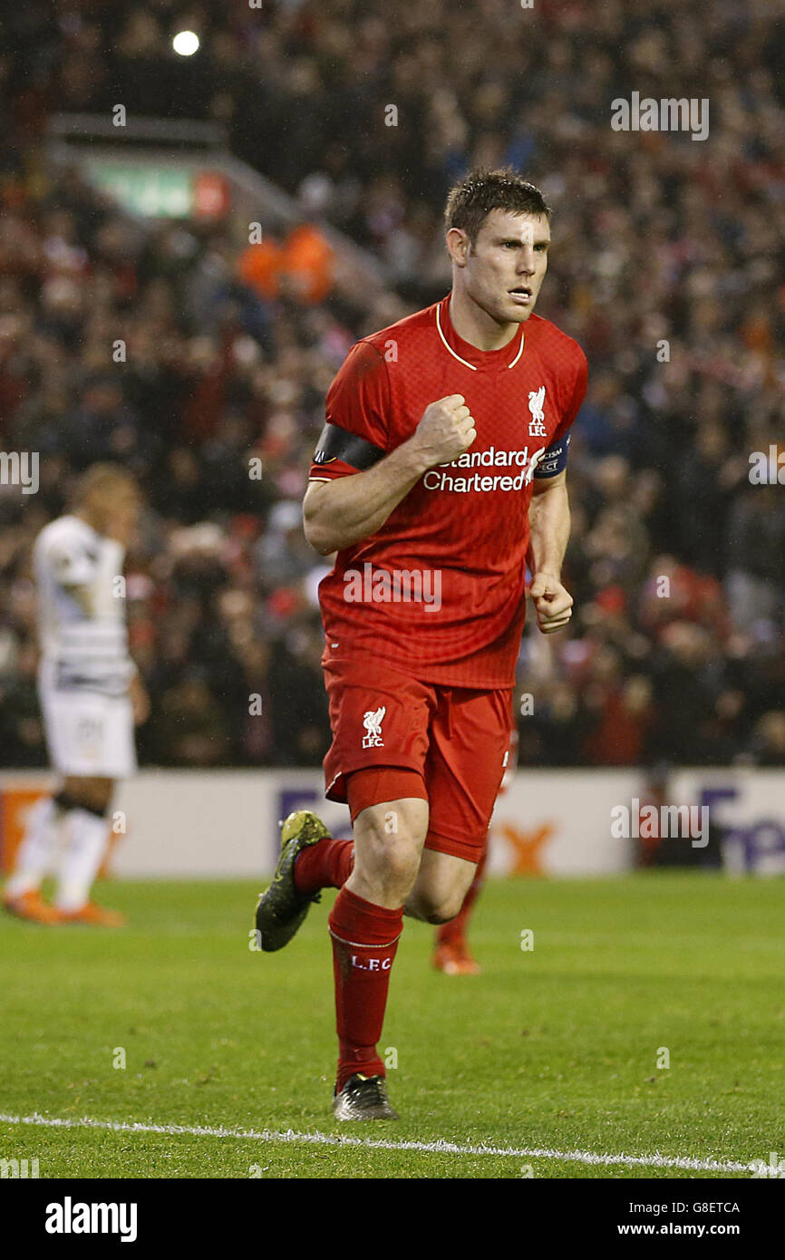 Liverpool's James Milner celebrates scoring their first goal of the ...