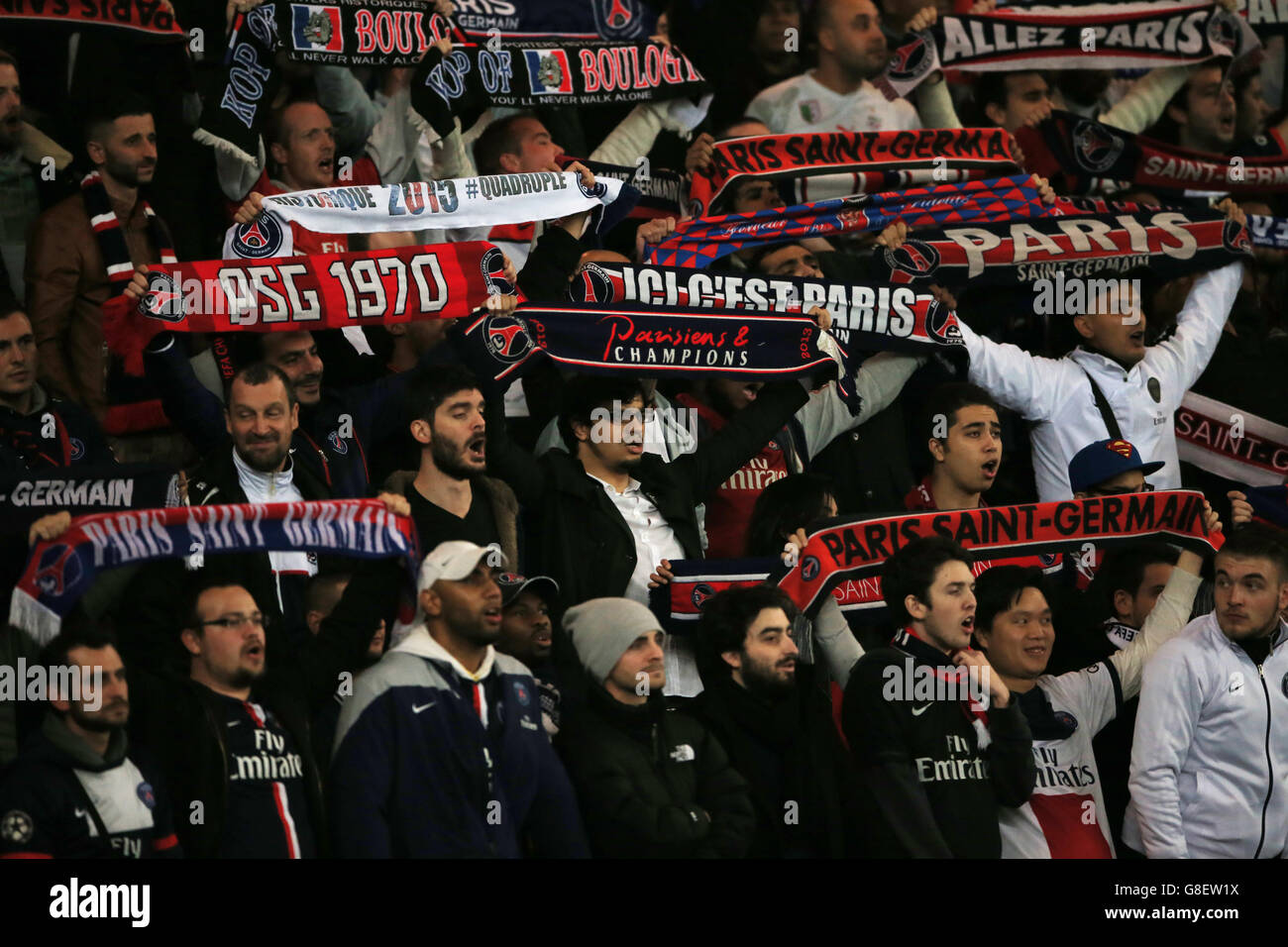 Paris saint germain fans in the stands hi-res stock photography and ...