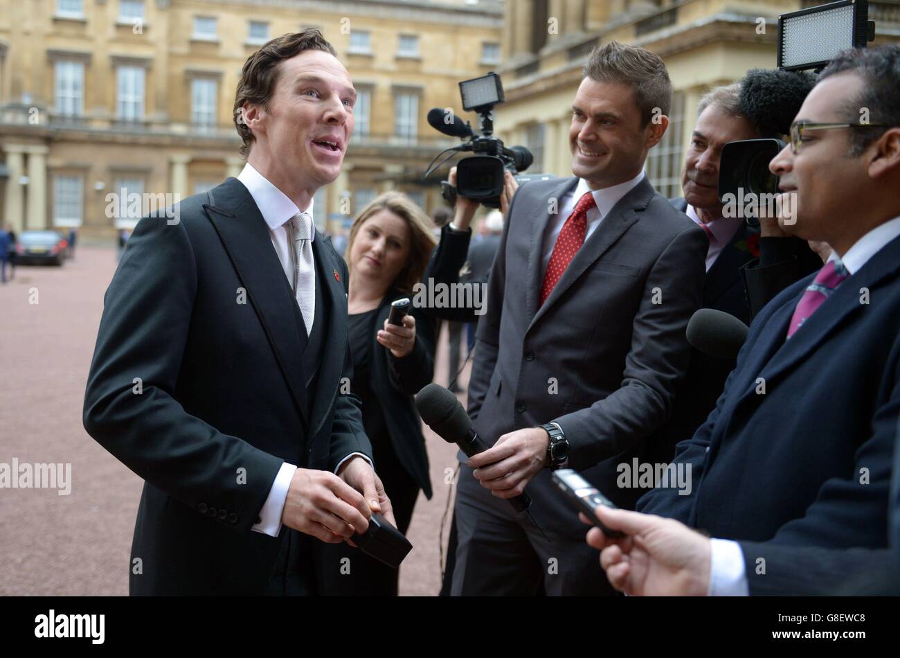 Actor Benedict Cumberbatch speaks to the media after receiving the CBE ...