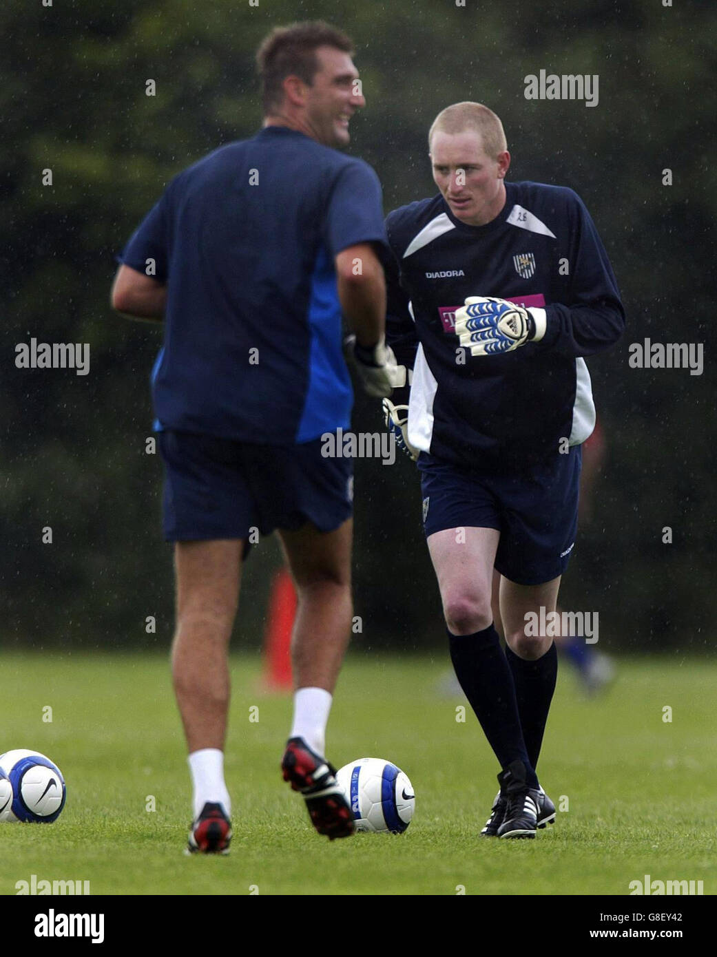 West Bromwich Albion first choice goalkeeper Russell Hoult (R) with ...