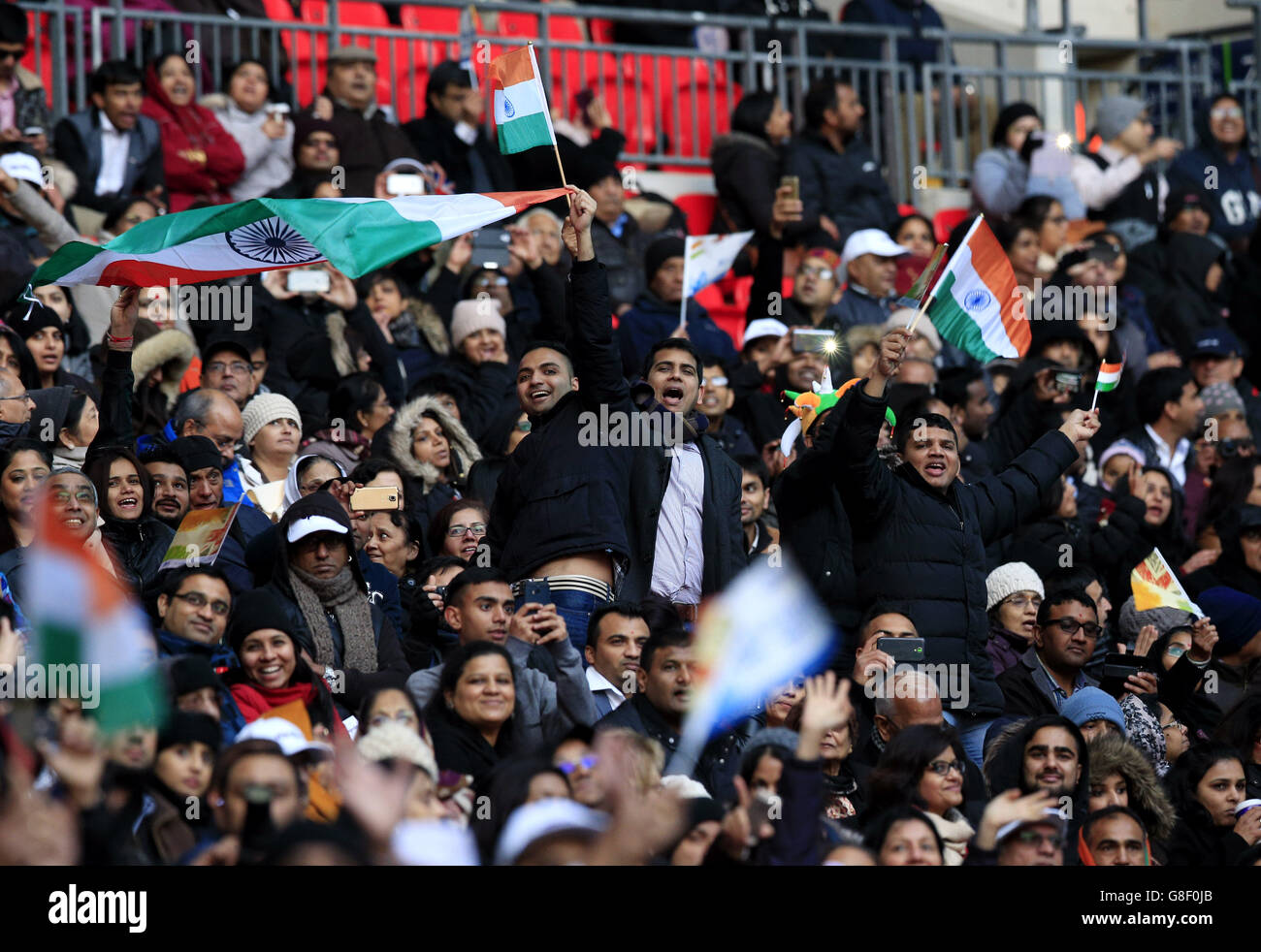 Indian flags are waved in the stands during the UK Welcomes Modi event ...