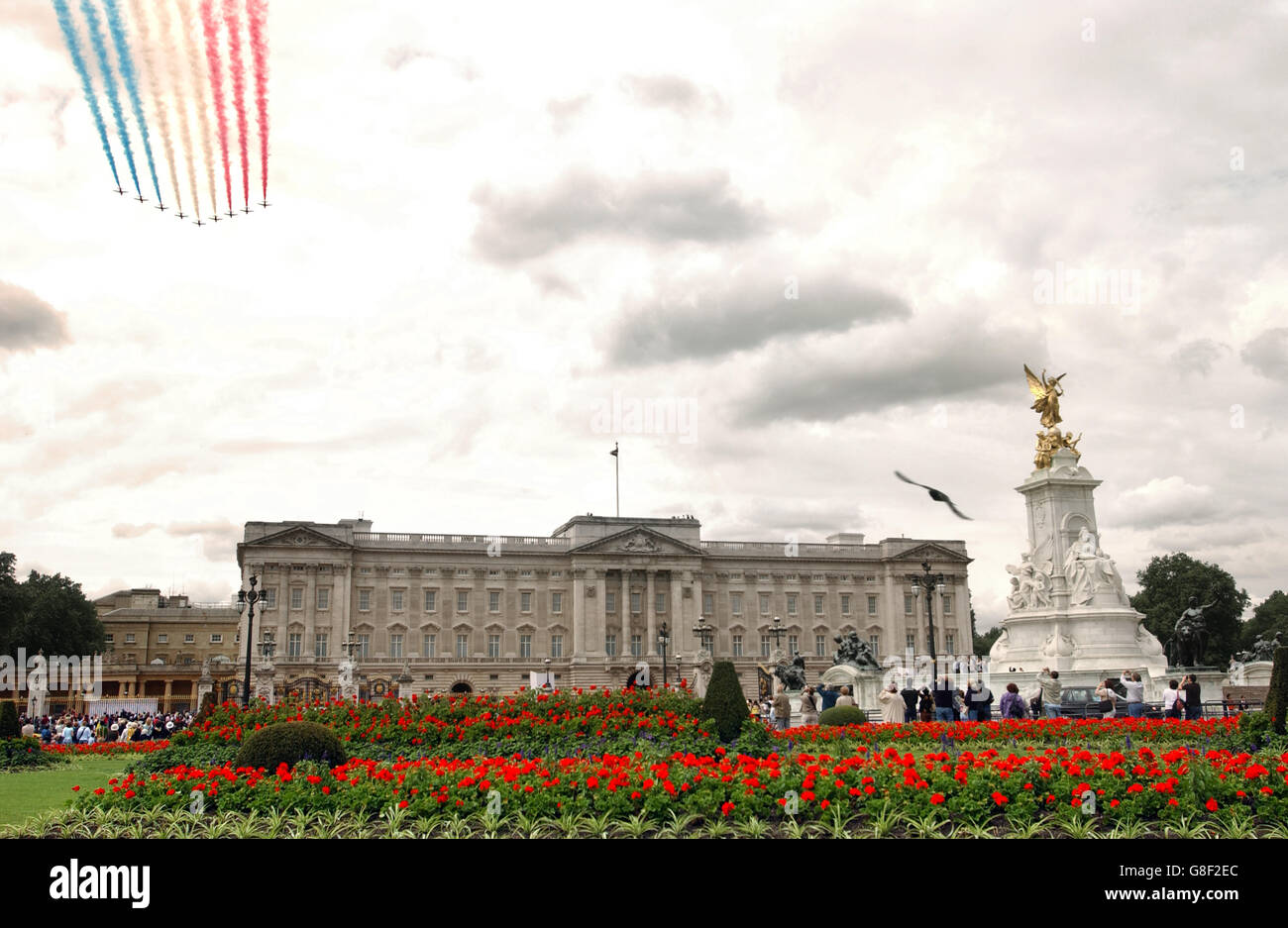 The RAF Red Arrows fly over Buckingham Palace in Central London. The ...