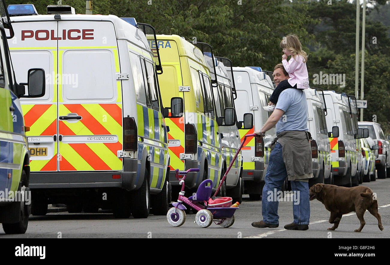 Police riot vans in the quiet village of Blackford near to the ...
