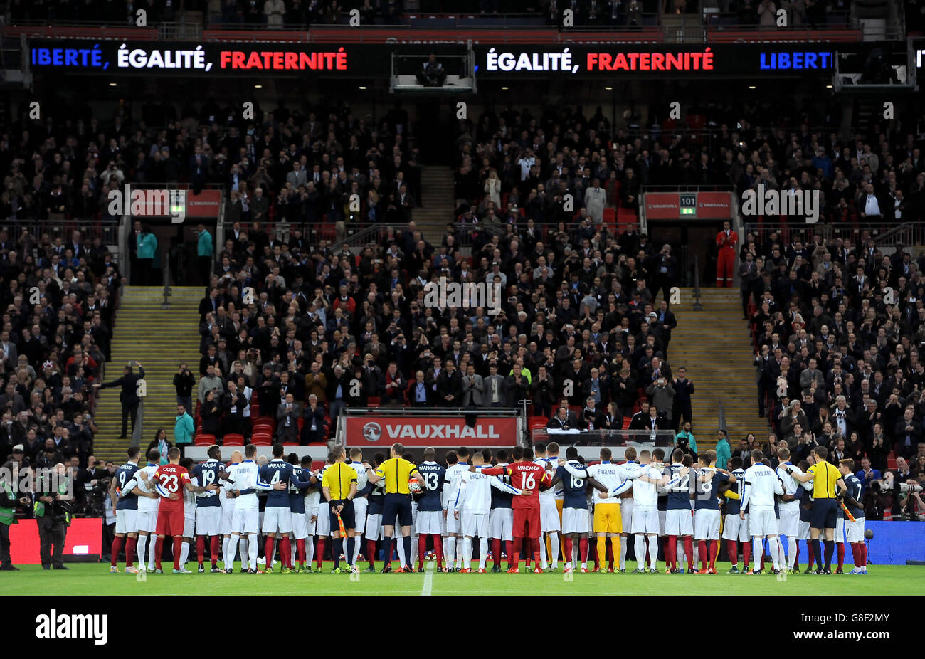 England and France players line up for a combined group photograph ...