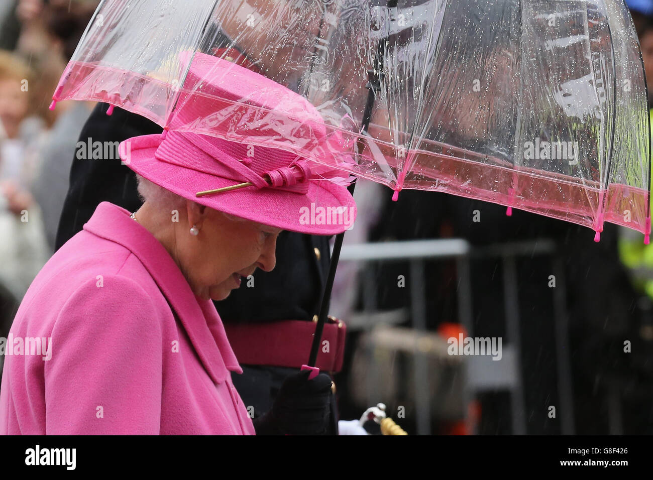 Queen Elizabeth II carries an umbrella after officially opening the ... Queen Elizabeth II carries an umbrella after officially opening the ...