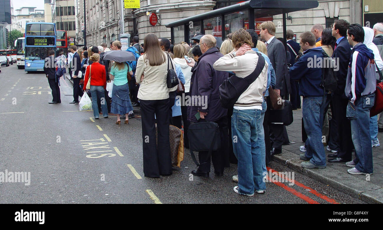 Passengers queue for buses at Victoria after the London Underground ...