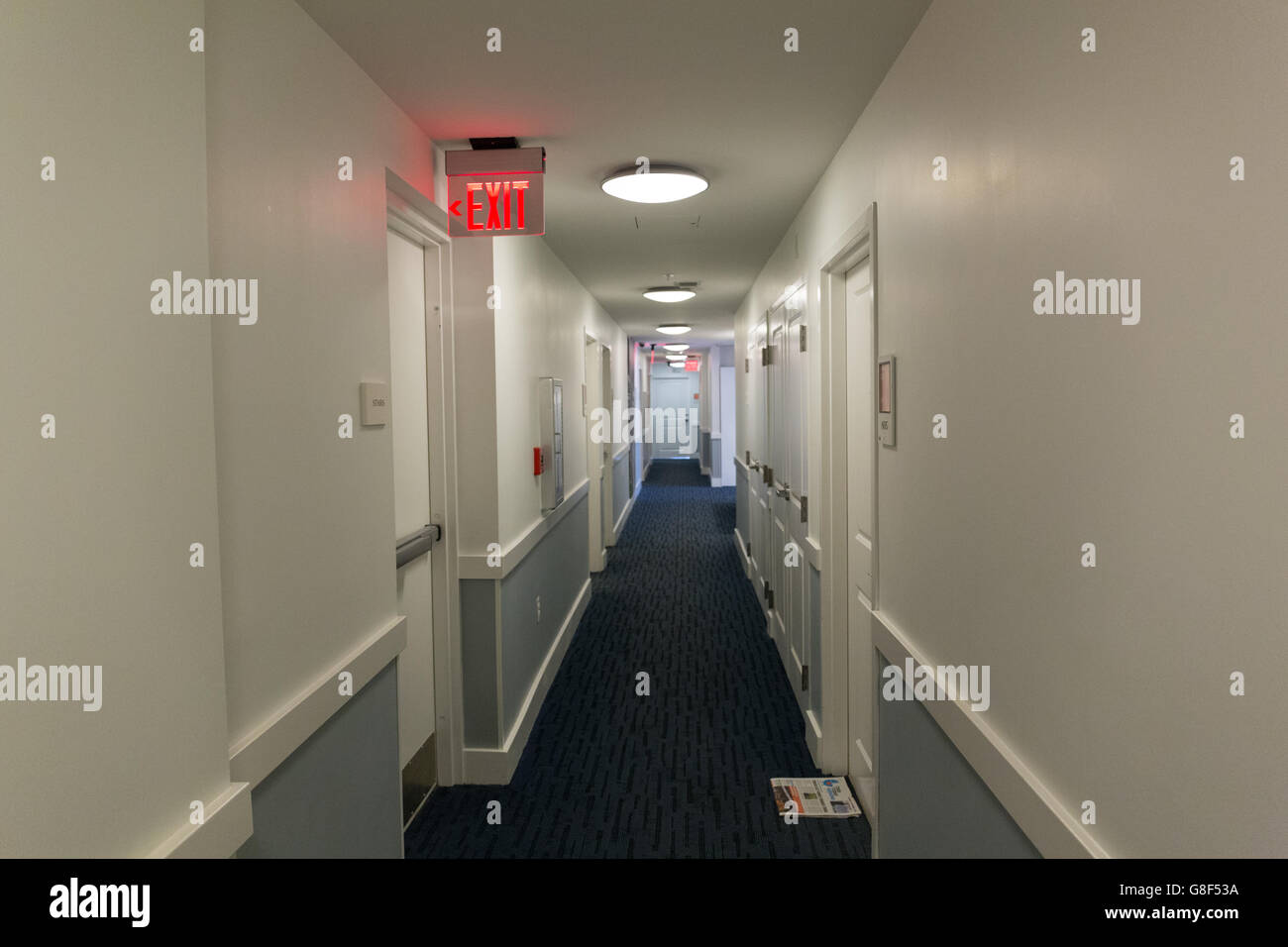 Exit sign in hallway hi-res stock photography and images - Alamy