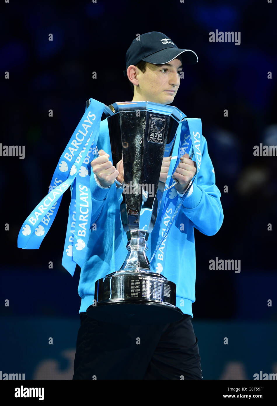 A ballboy brings out the ATP World Tour Finals trophy at the O2 Arena ...