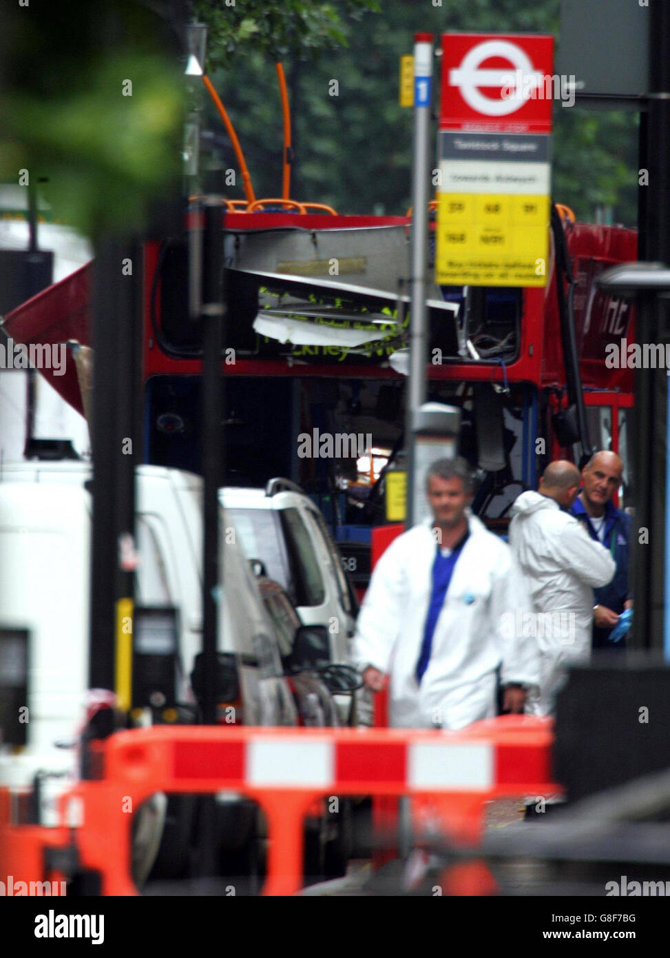 The number 30 bus on which a bomb exploded, killing 13 people, sits in ...