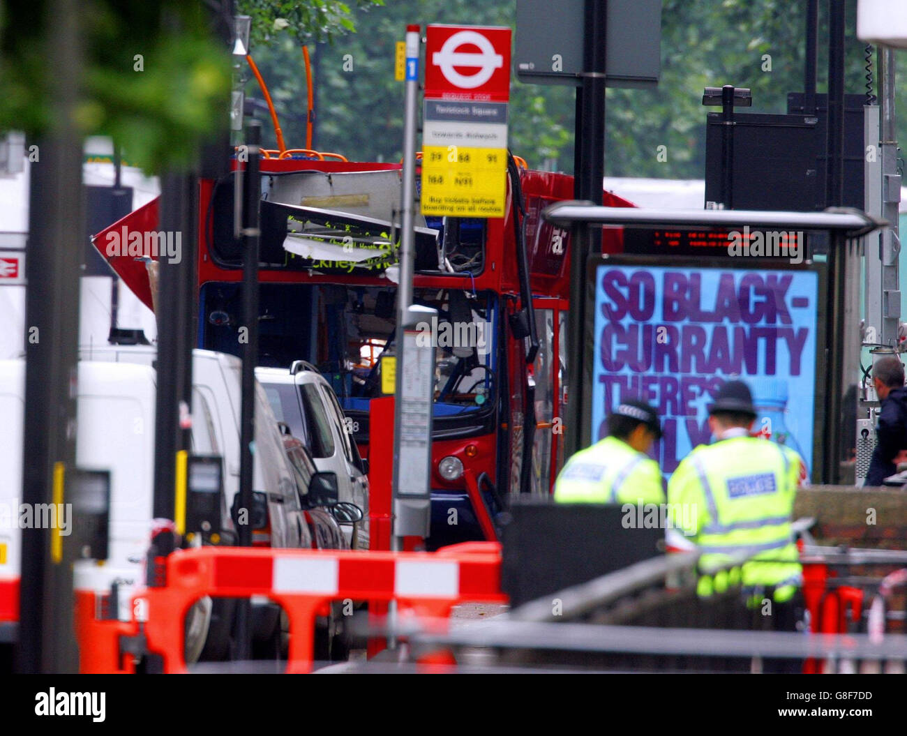 The number 30 bus on which a bomb exploded, killing 13 people, sits in ...