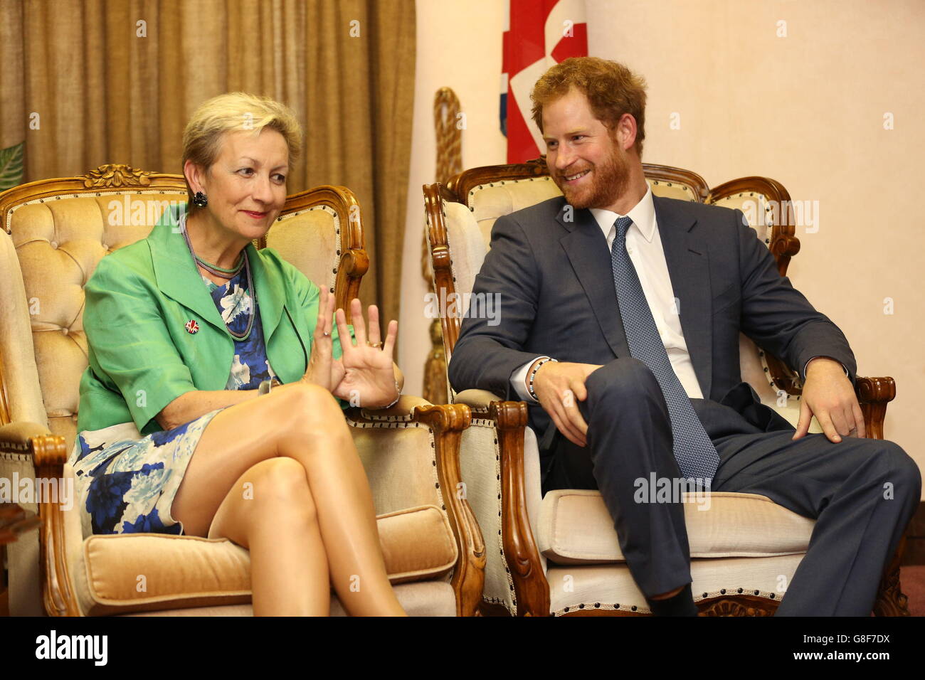 Prince Harry with the British High Commisioner Judith MacGregor during ...