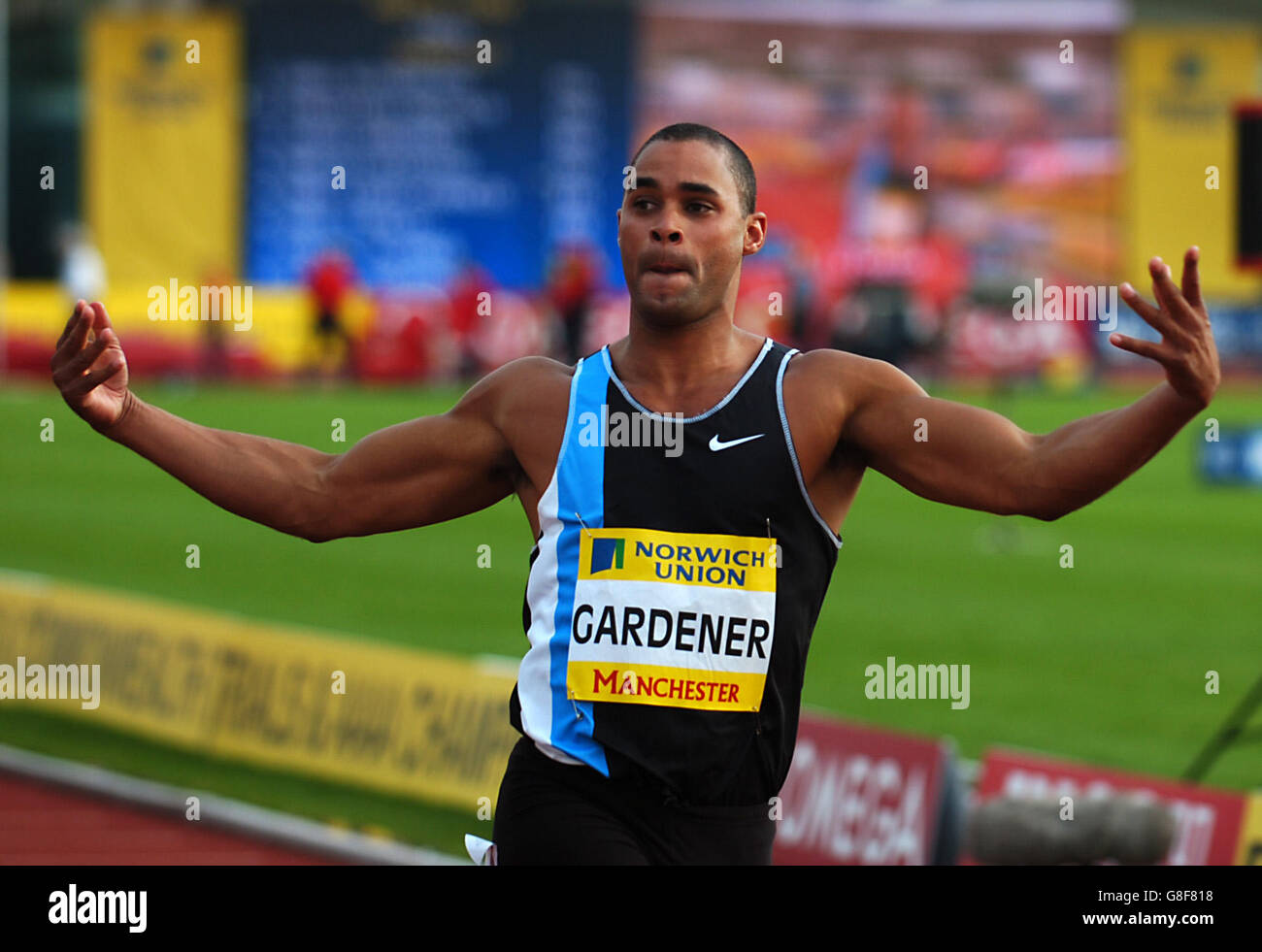 Great Britain's Jason Gardener celebrates his victory as he crosses the ...