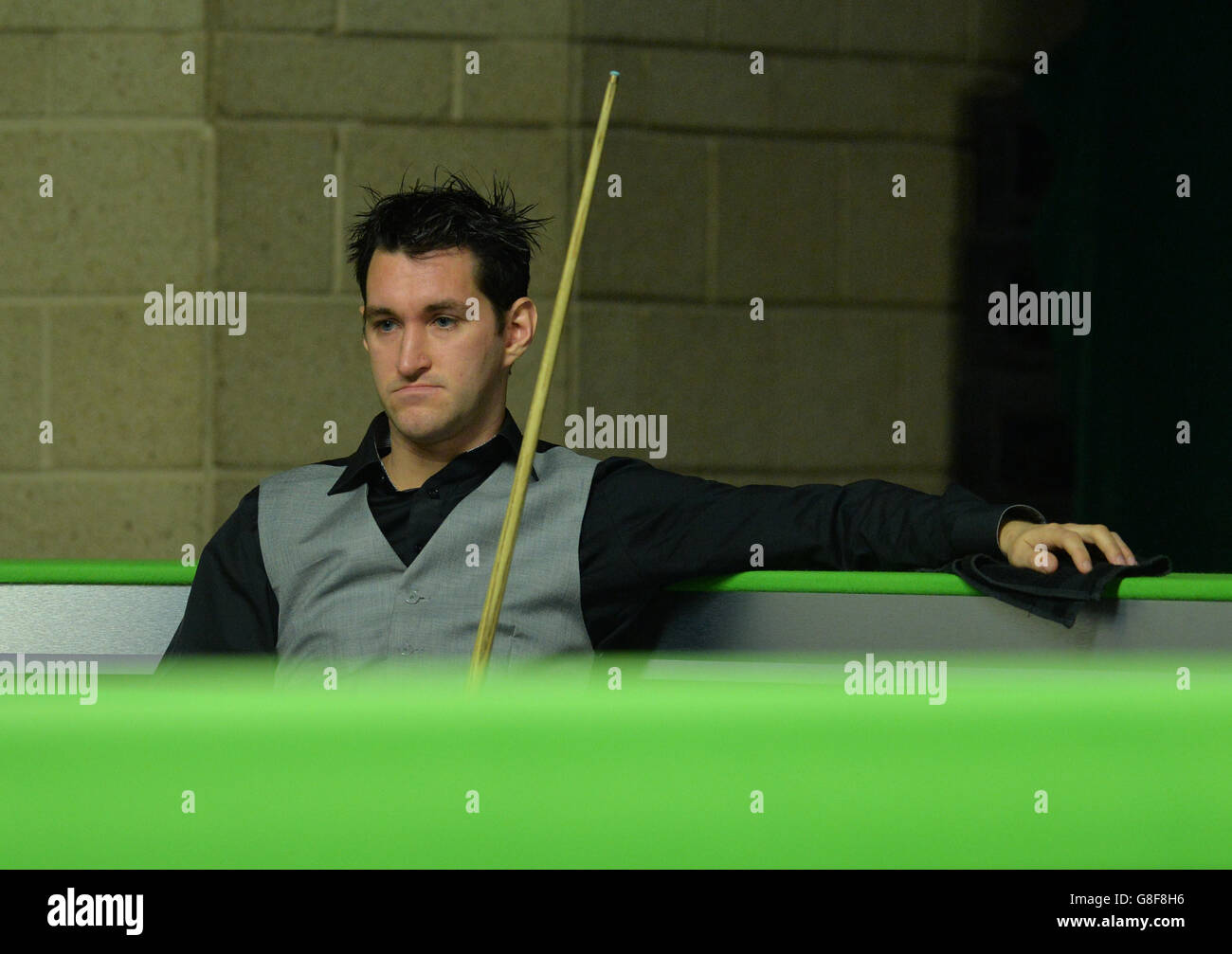 Tom Ford sits in his chair in his match against Mark Williams during ...