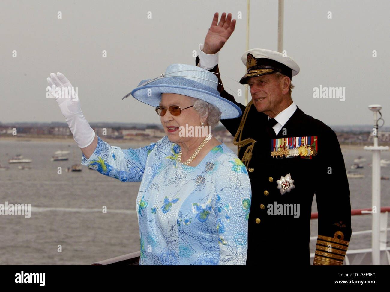 Britain's Queen Elizabeth II and The Duke of Edinburgh wave on board ...