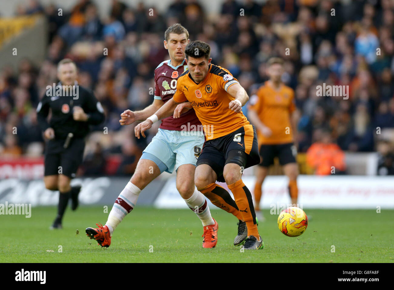 Burnley's Sam Vokes (left) and Wolverhampton Wanderers' Danny Batth ...