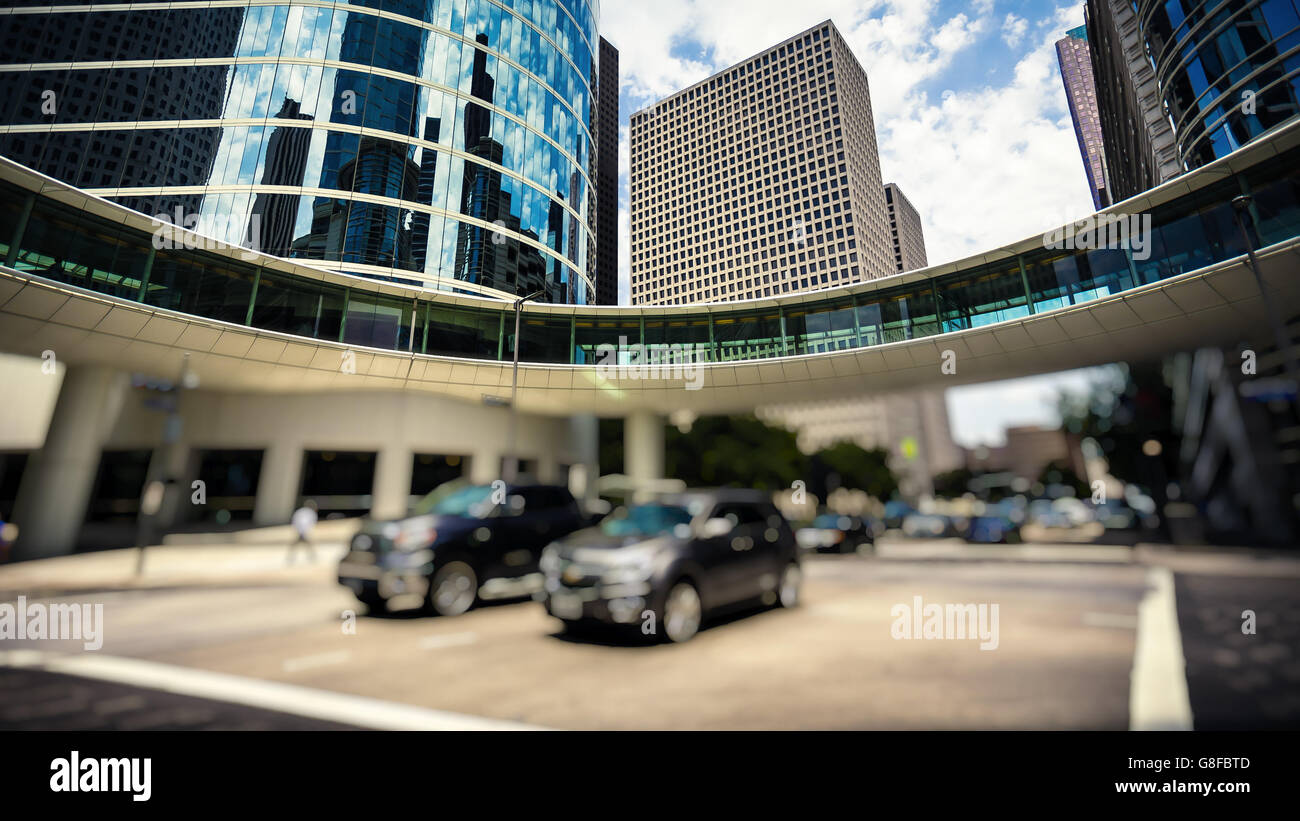 Traffic and modern office buildings in downtown Houston, Texas during ...