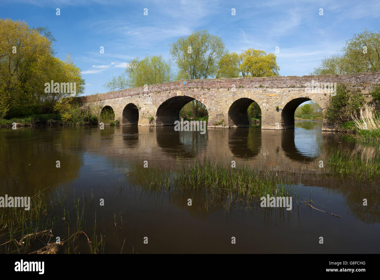 The historic Medieval arched Pershore Bridge spanning the River Avon ...
