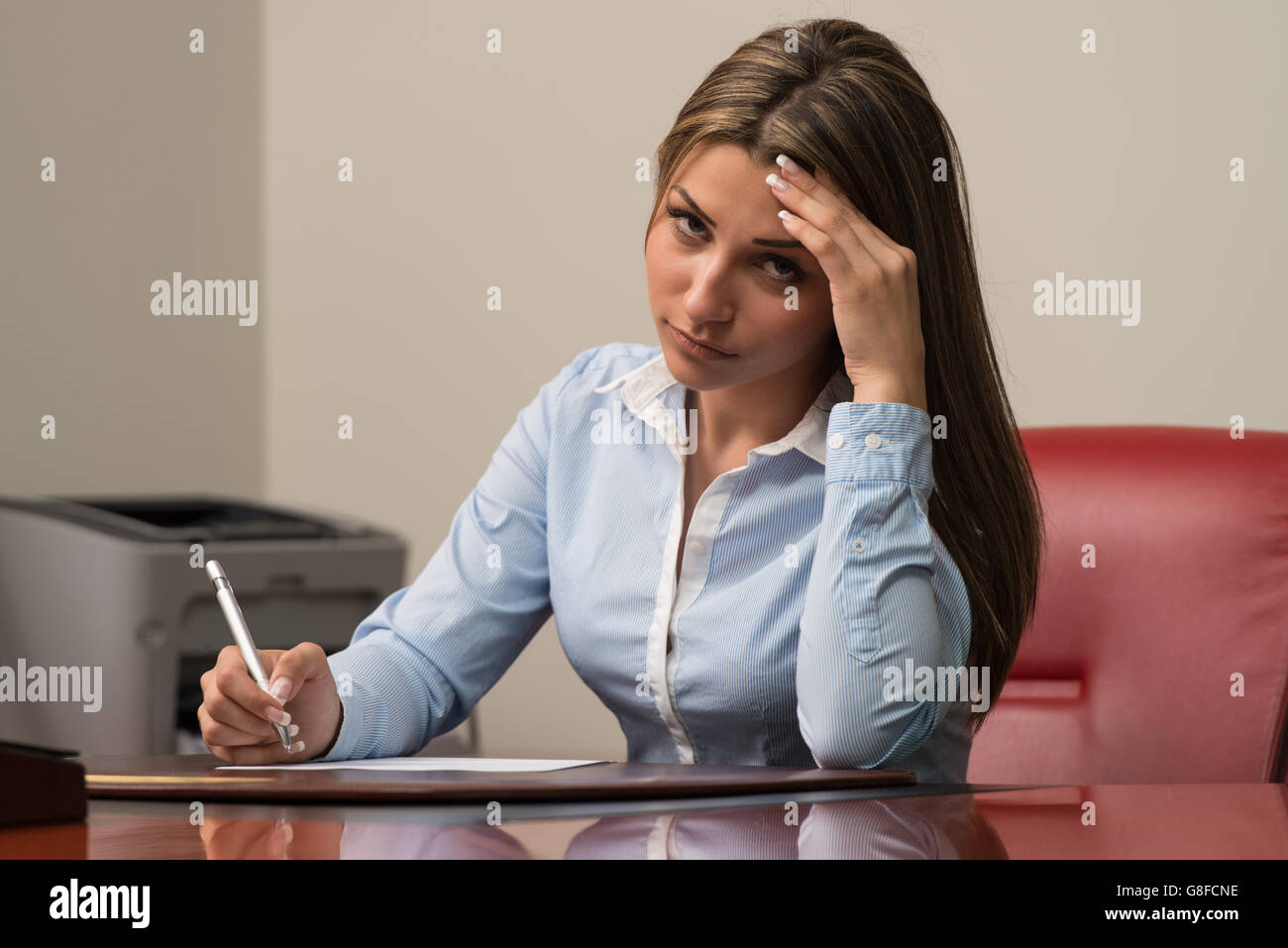 Stressed Woman Holding Her Head With Hand In Office - Business Woman ...