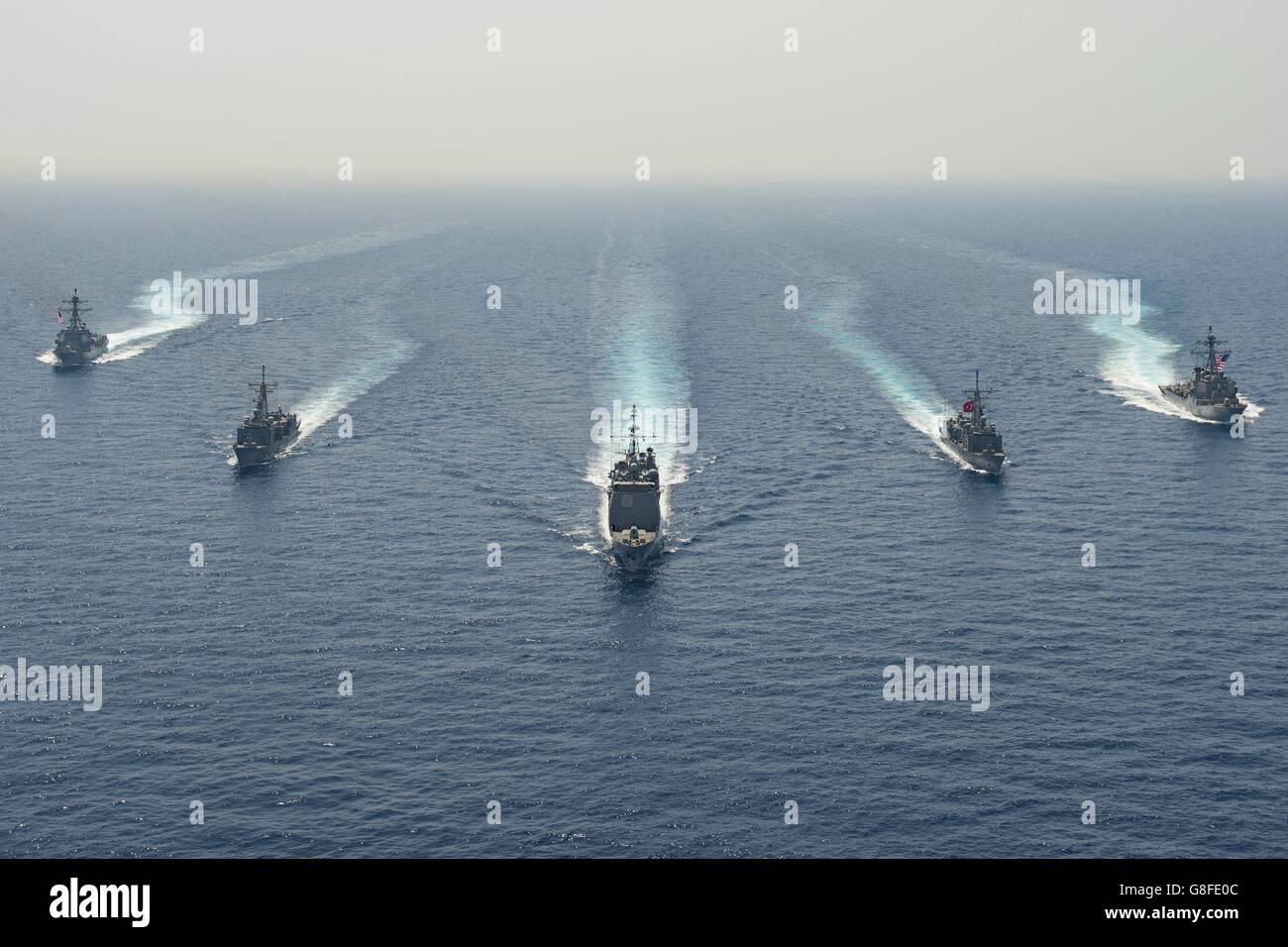 U.S and Turkish Navy ships steam in formation during ASWEX anti ...