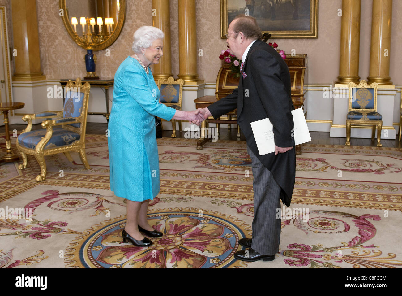 Queen Elizabeth II grants the Ambassador of Ecuador Carlos Abad Ortiz ...