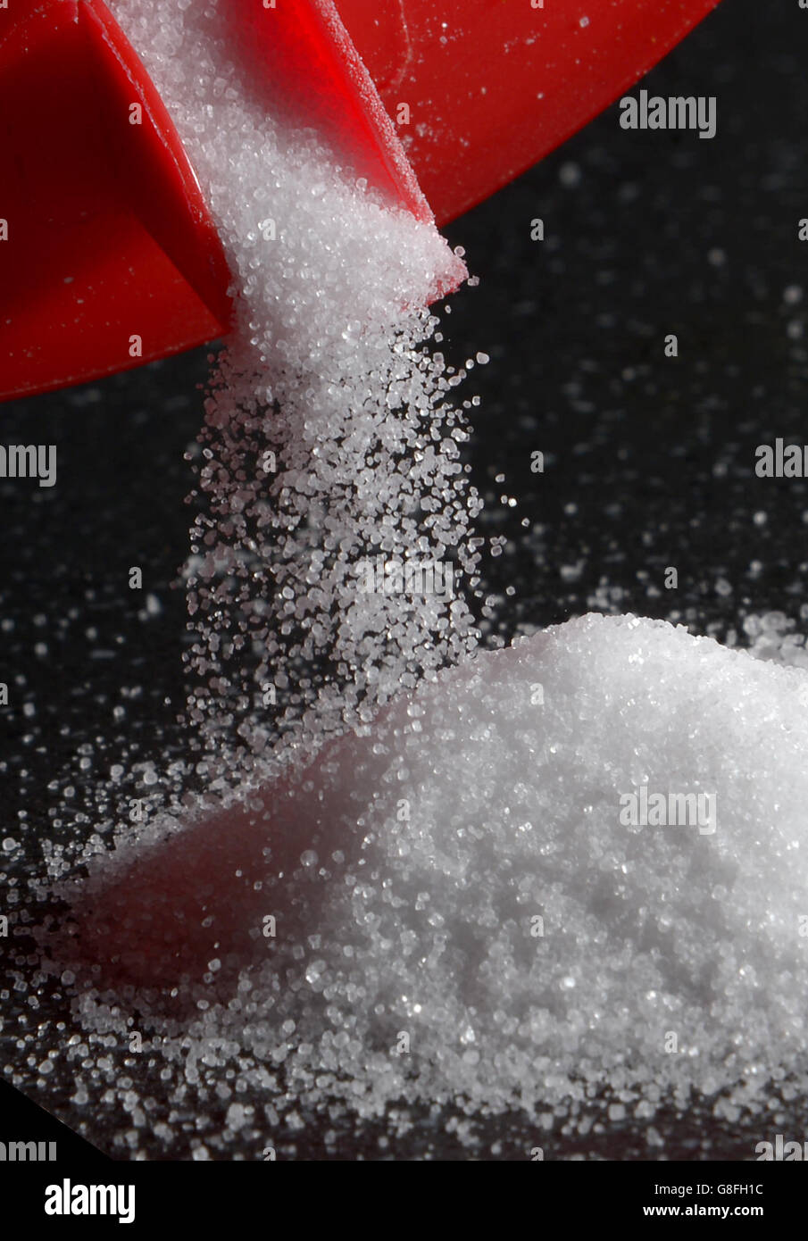 Salt stock. Table salt is poured, London Stock Photo - Alamy