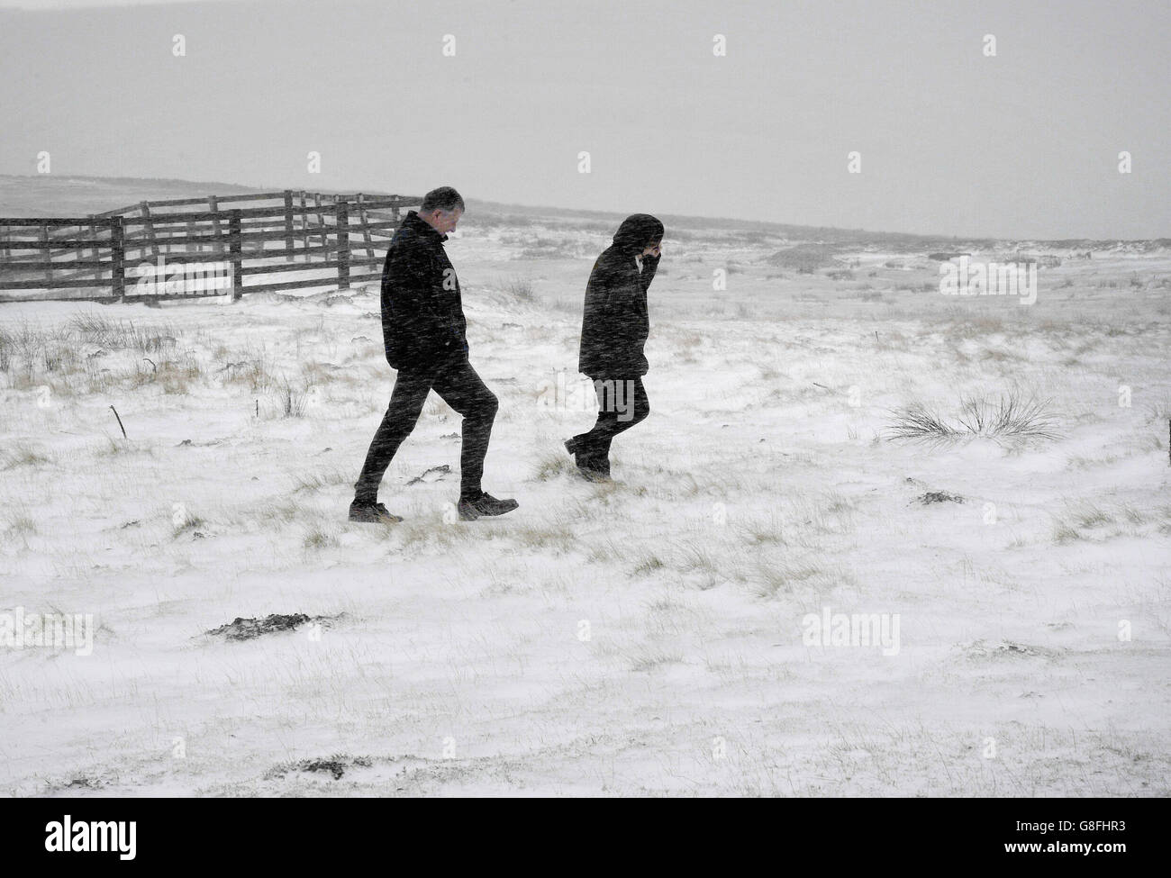 Walkers brave the freezing temperatures and gale force winds on the ...