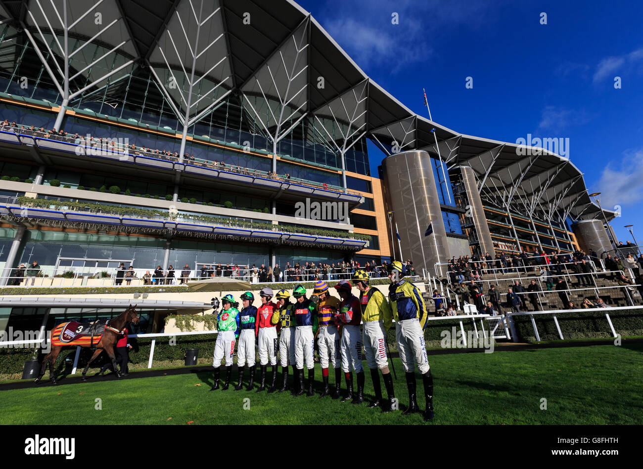 The jockeys observe a minutes silence before the start of racing for ...