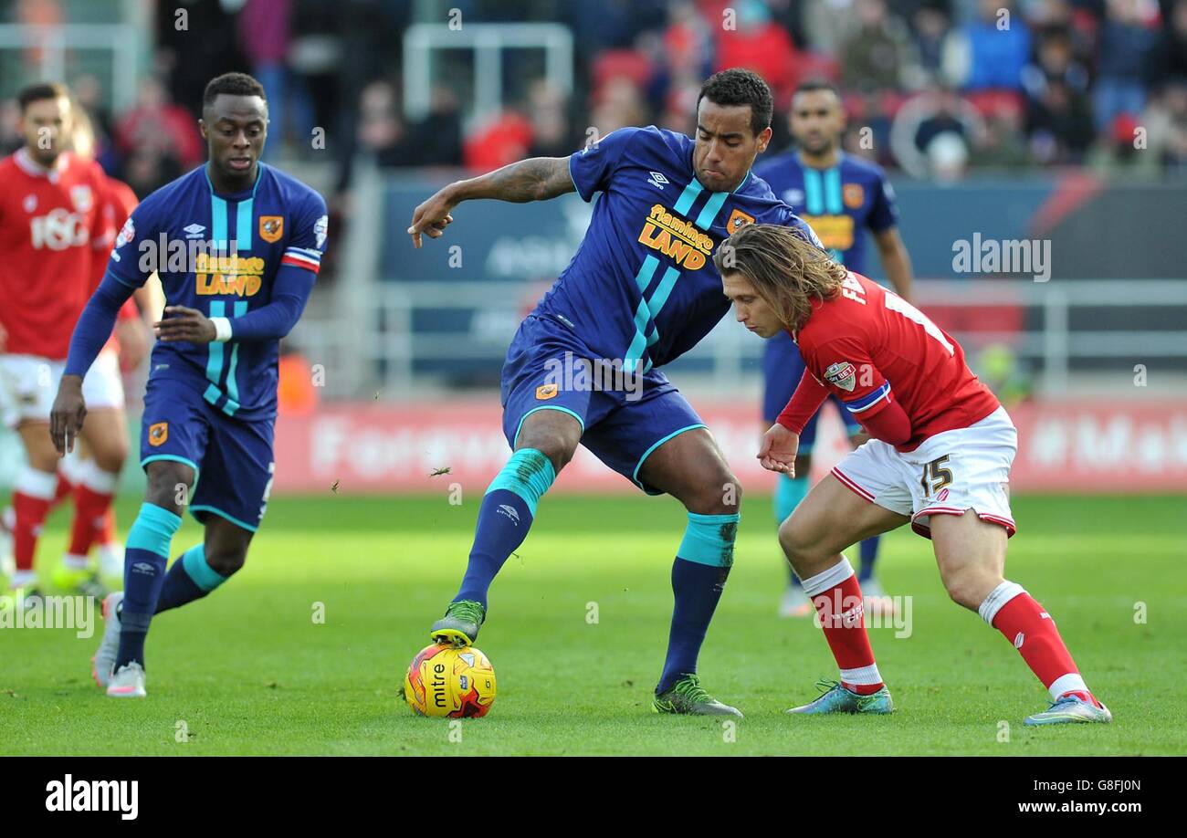 Hull City's Tom Huddlestone and Bristol City's Luke Ayling in action ...