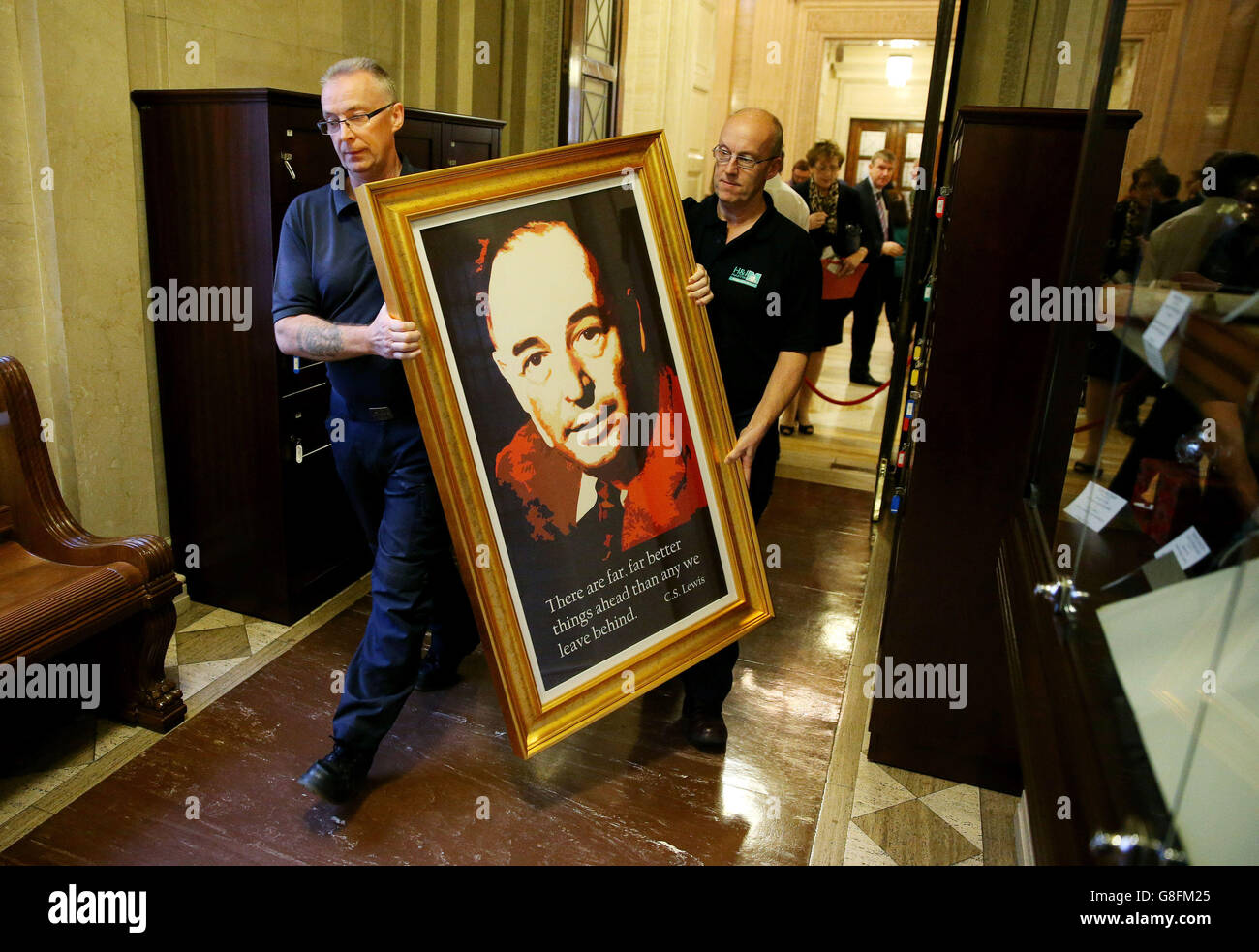 A portrait of CS Lewis is prepared for hanging as portraits of famous ...