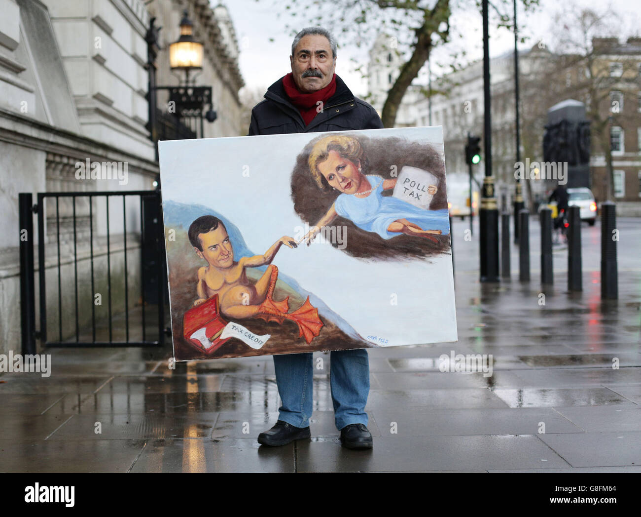 Artist Kaya Mar with his painting outside Downing Street in London ...