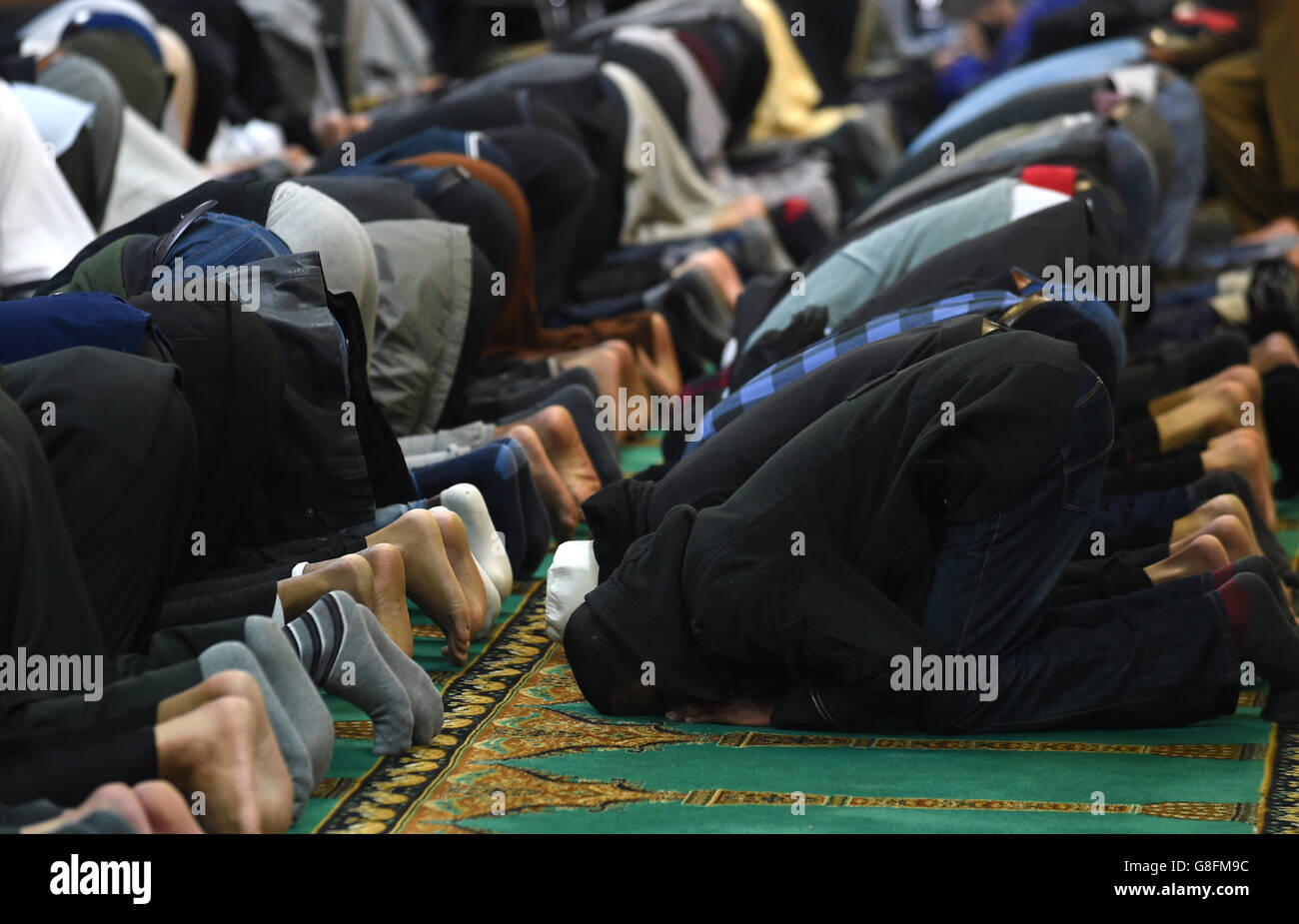Birmingham Central mosque. Muslim men pray at Birmingham Central Mosque ...