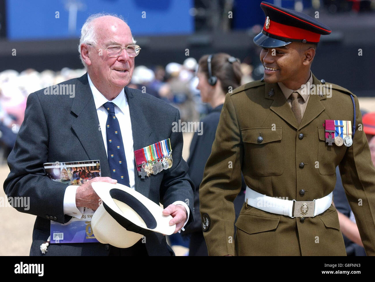 Private Johnson Beharry (right) accompanies fellow Victoria Cross ...