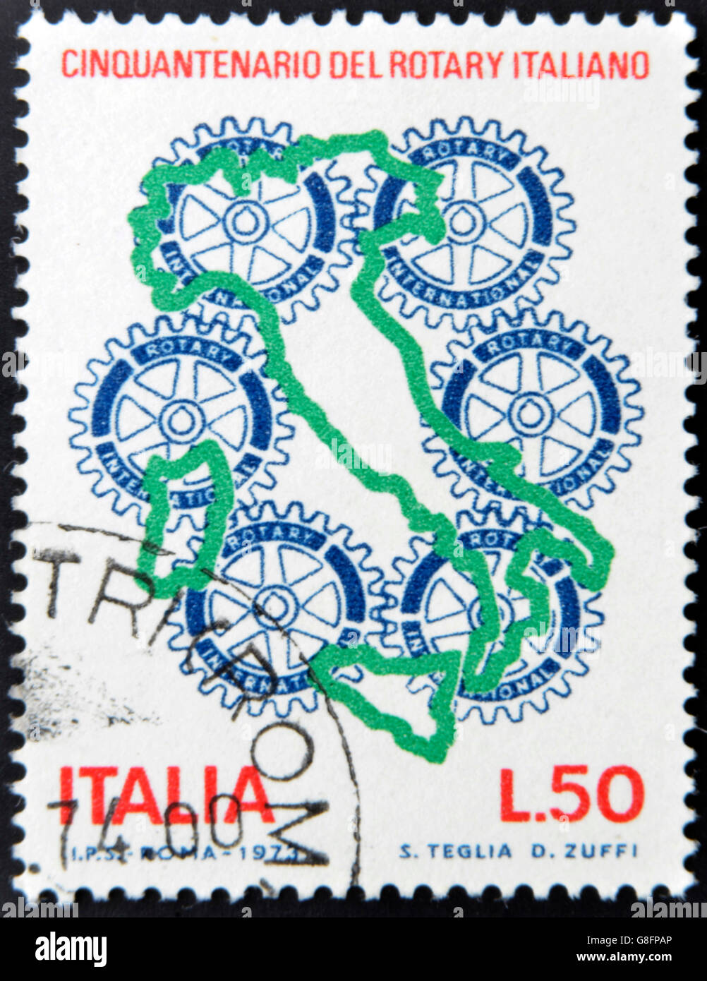 ITALY - CIRCA 1973: a stamp printed in Italy shows Rotary Emblem, 50 ...