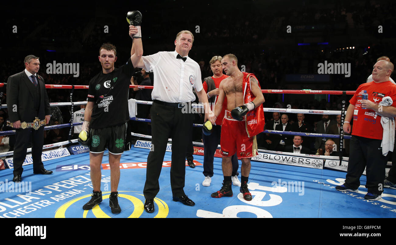 Scott Cardle (left) celebrates beating Sean Dodd in their British ...