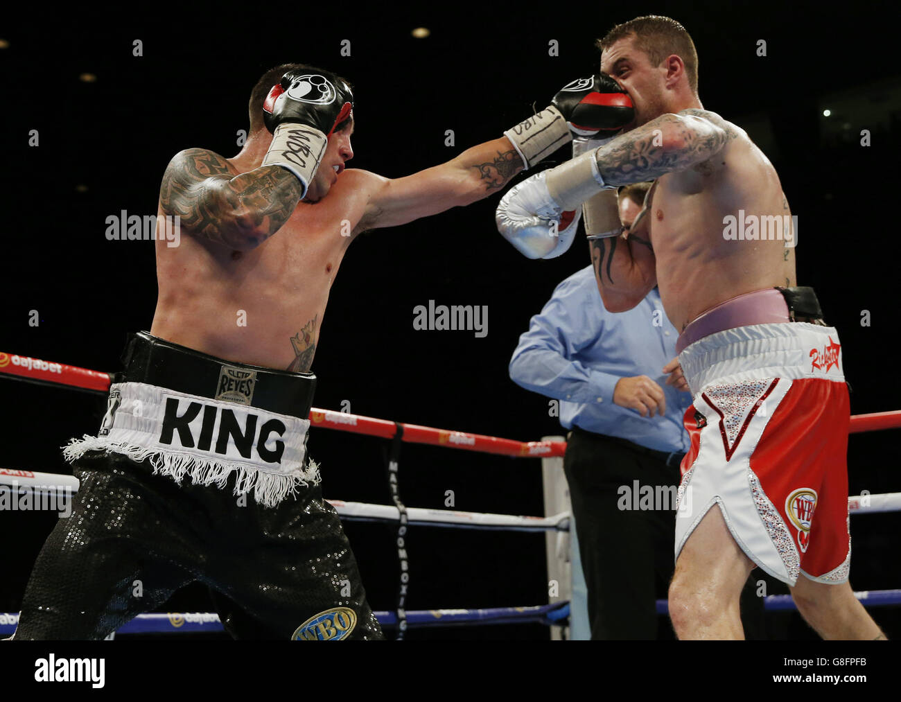 Boxing - Liverpool Echo Arena. Ricky Burns (right) and Josh King during ...