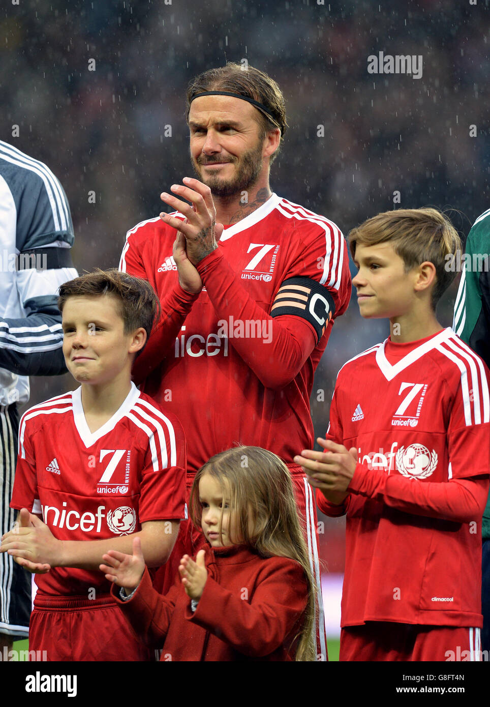 Great Britain & Ireland's David Beckham with his kids, Romeo (right ...
