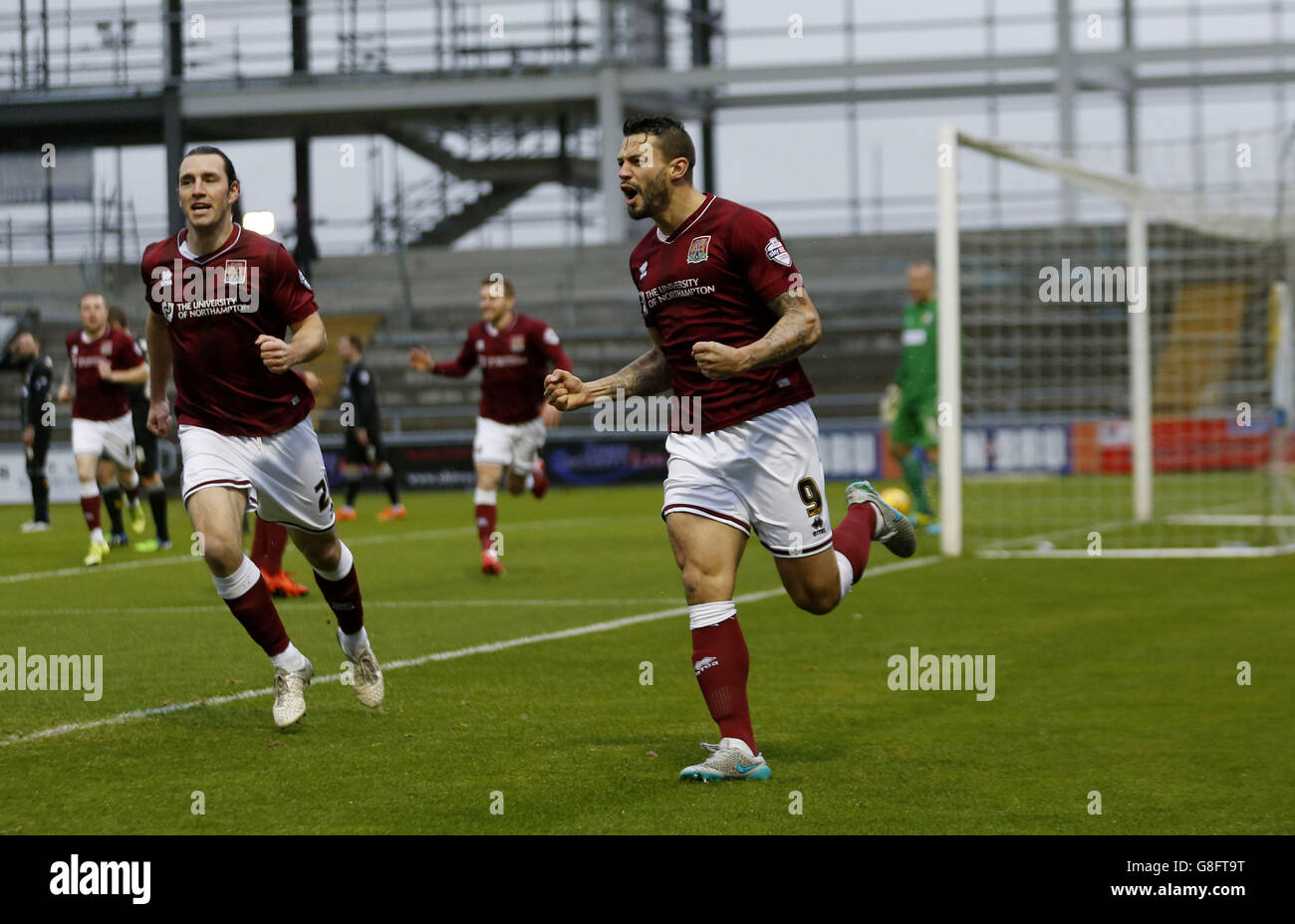 Northampton Town's Marc Richards (right) celebrates scoring their first ...