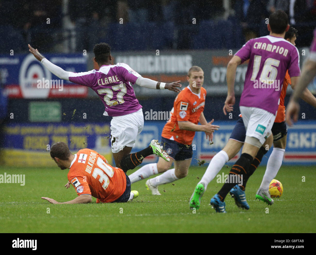 Barnet's Josh Clarke (27) and Luton Town's Luke Wilkinson (30) during ...