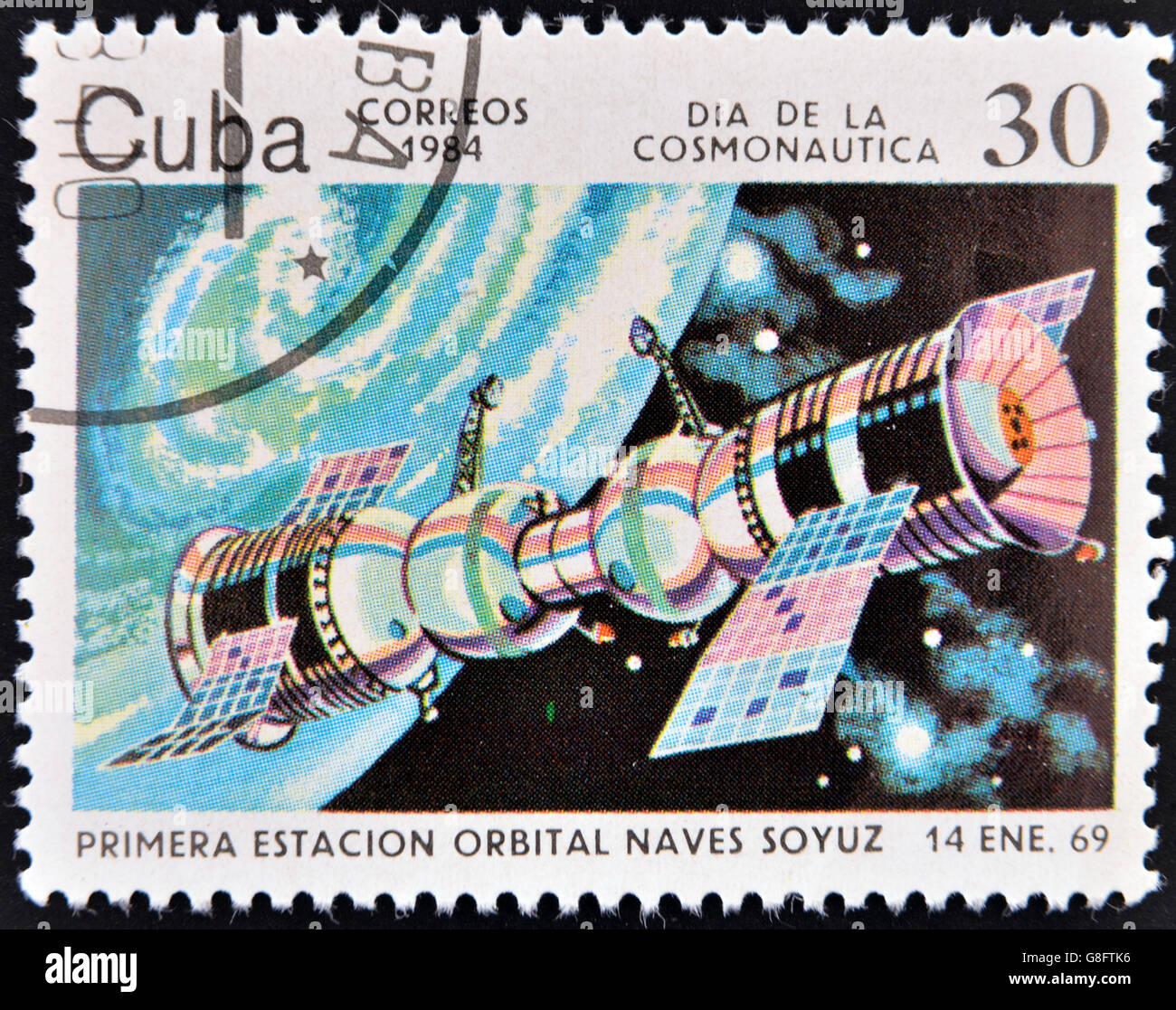 CUBA - CIRCA 1984: A stamp printed in Cuba shows first space station ...