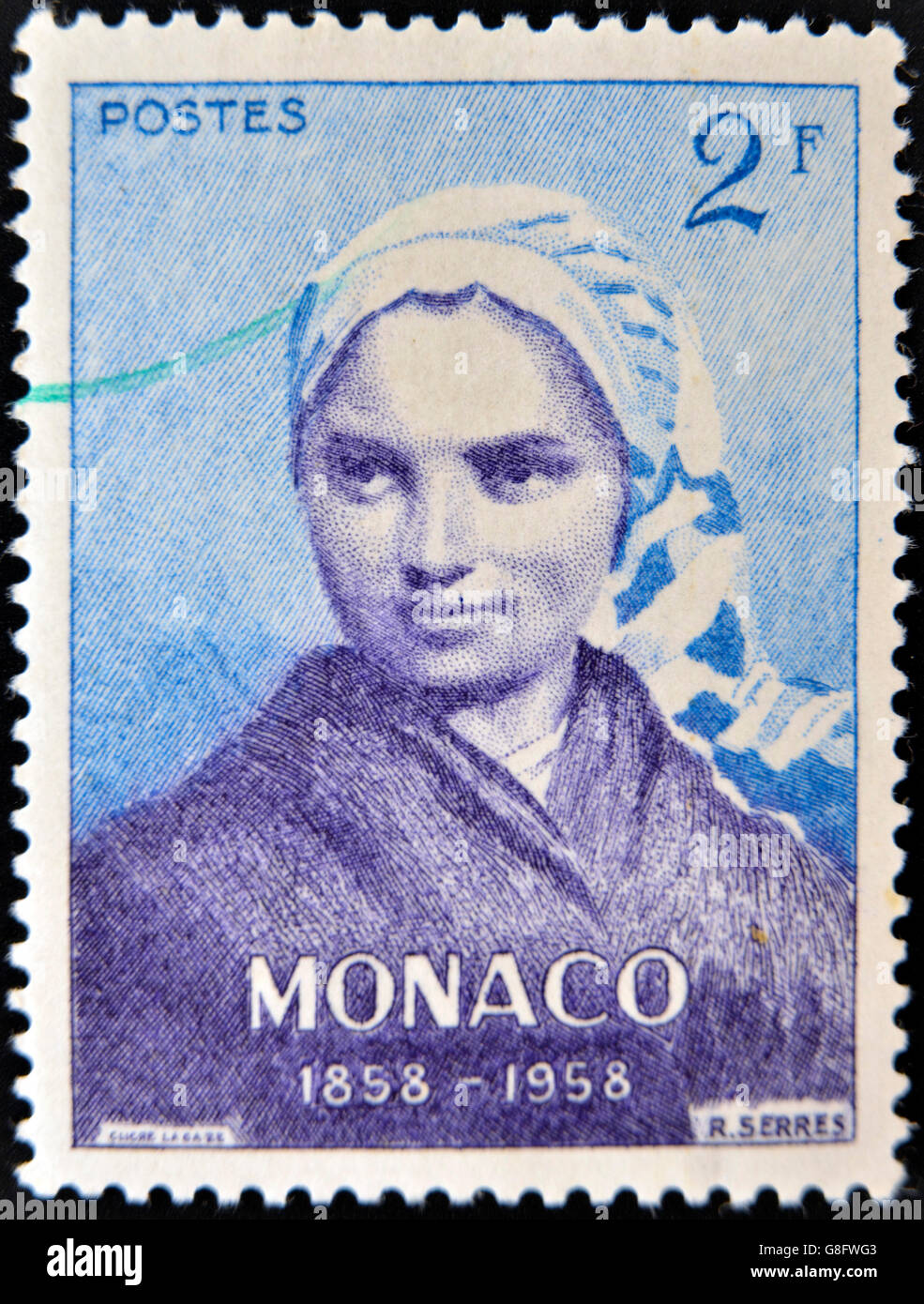 MONACO - CIRCA 1958: A stamp printed in Monaco shows a Bernadette ...