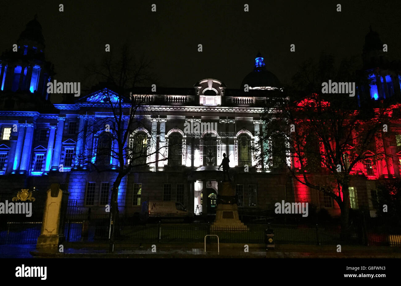 Belfast City Hall, illuminated with the colours of the French tricolor ...