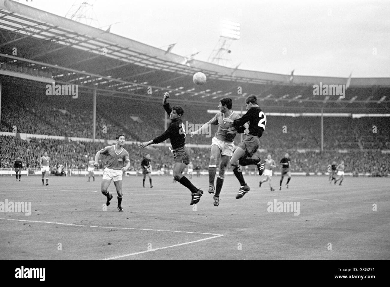 Mexico's Enrique Borja (r) climbs above teammate Guillermo Hernandez ...