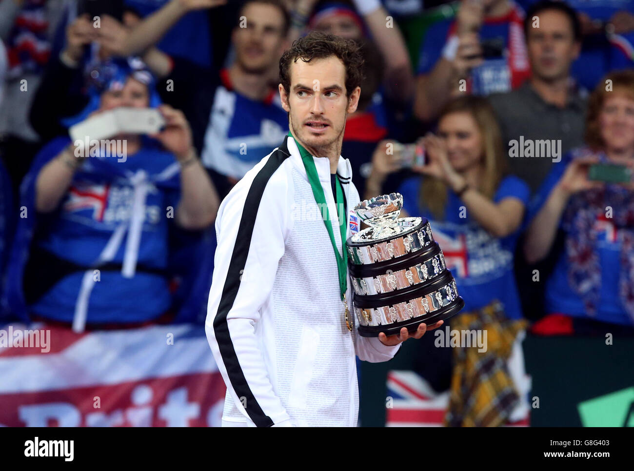 Great Britain's Andy Murray with a replica trophy during day three of ...
