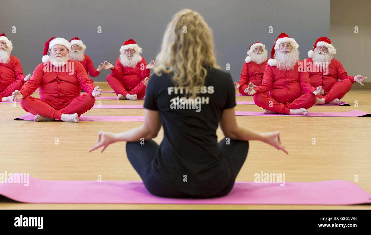 Members of The Ministry of Fun's Santa School, dressed as Father ...