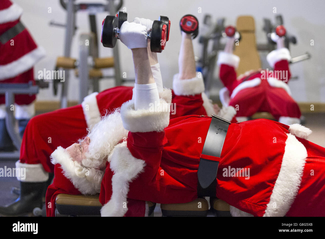 EDITORIAL USE ONLY Members of The Ministry of Fun's Santa School ...