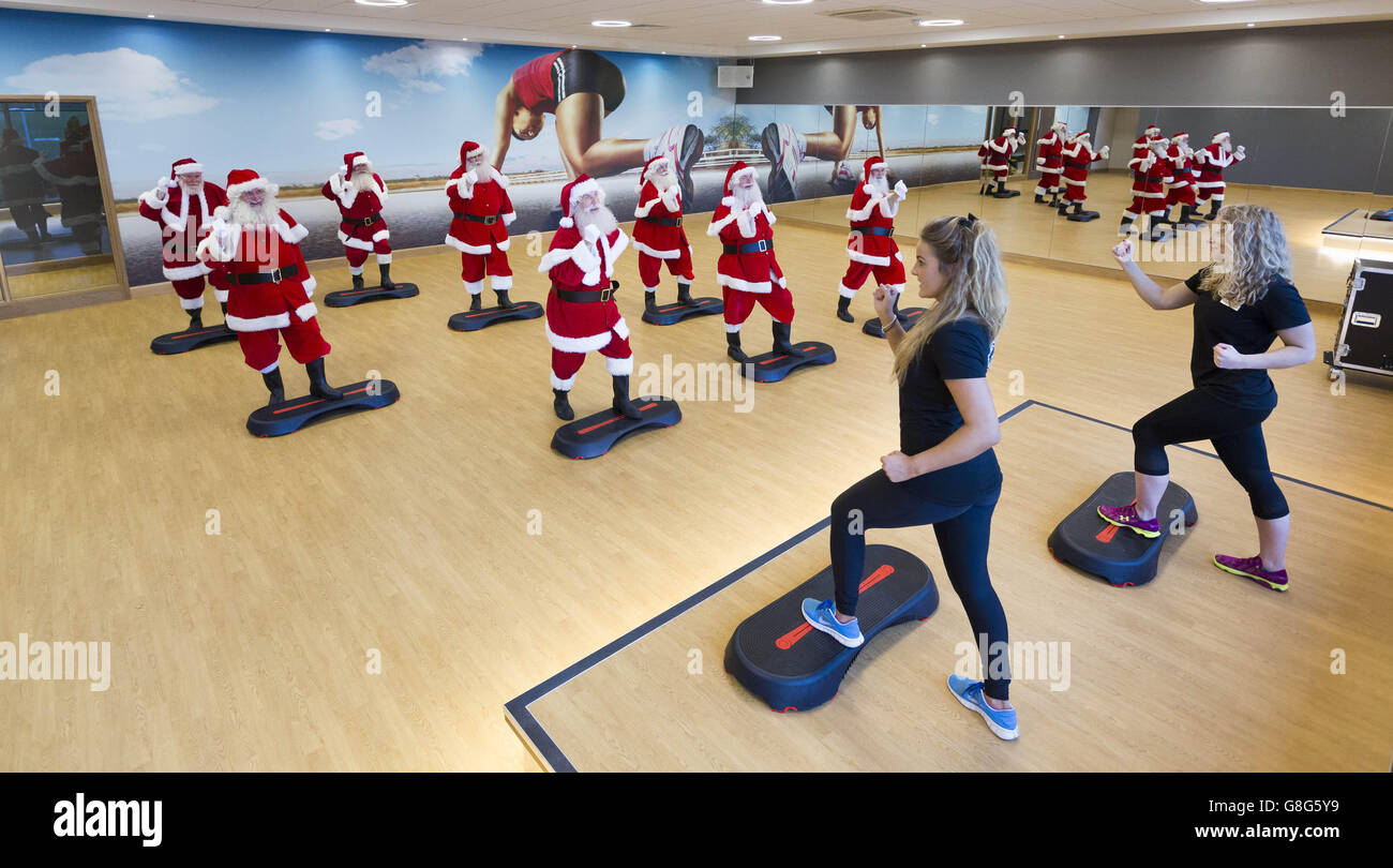 Members of The Ministry of Fun's Santa School, dressed as Father ...