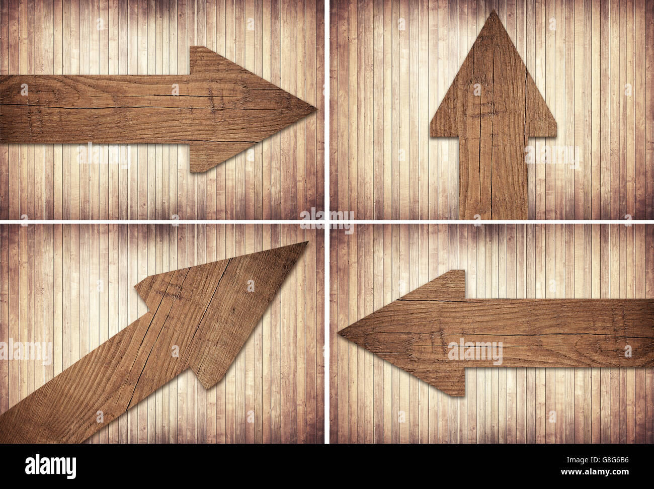 Set of dark brown wooden arrow are on wall Stock Photo - Alamy