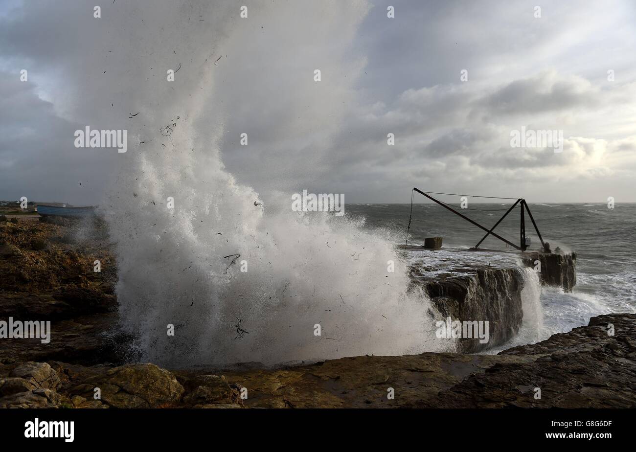 Waves crash into the coast near Portland Bill in Dorset, as gale-force ...