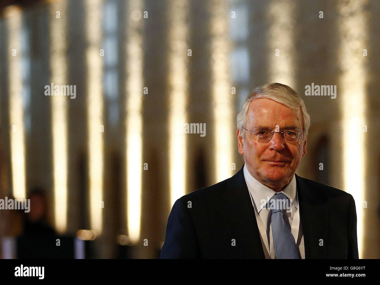 Former British Prime Minister John Major arrives at the opening ...